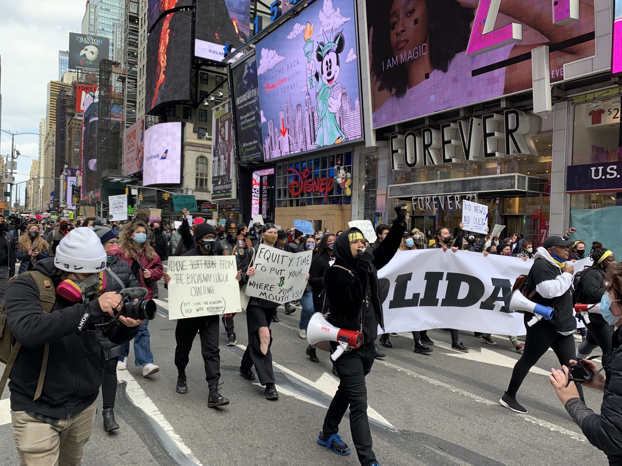 Theater workers march to demand change on Broadway